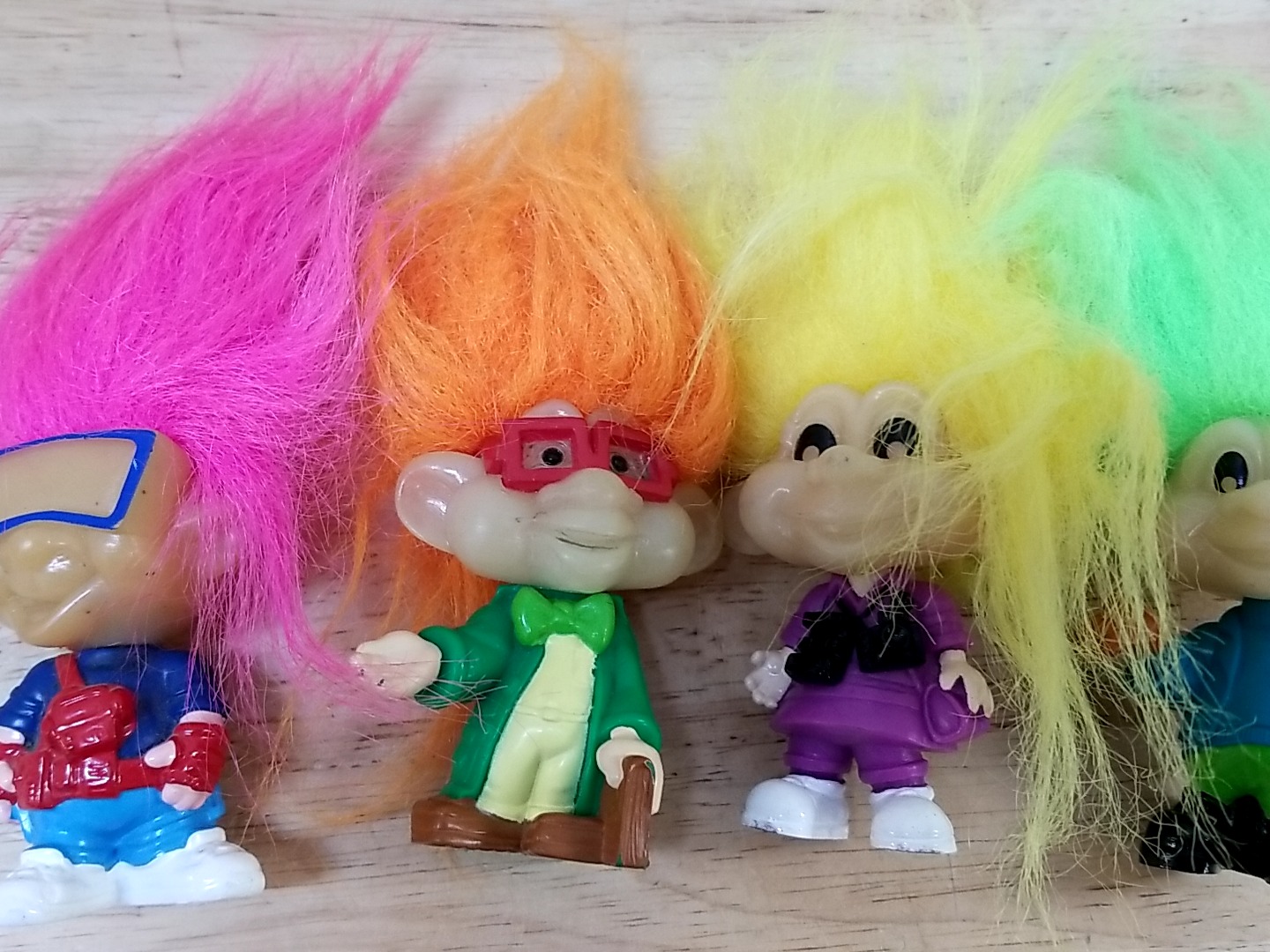 #228 - Set of 4 Colorful Troll Dolls | BidItBob